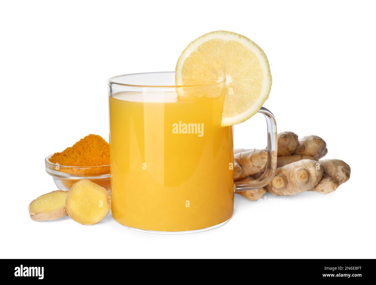 Immunity boosting drink with lemon, ginger and turmeric on white ...