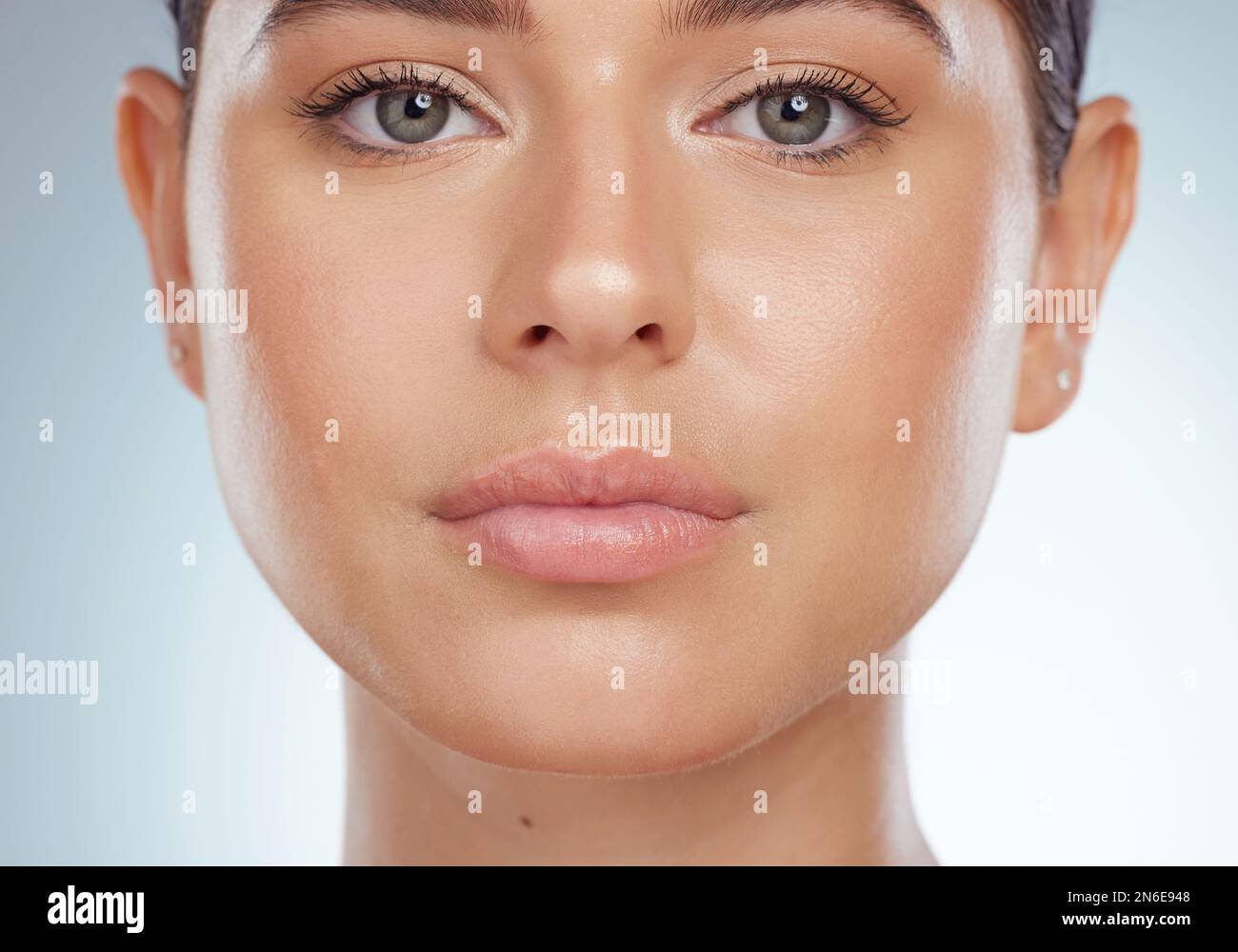 Closeup portrait of beautiful woman with smooth glowing face. Headshot ...