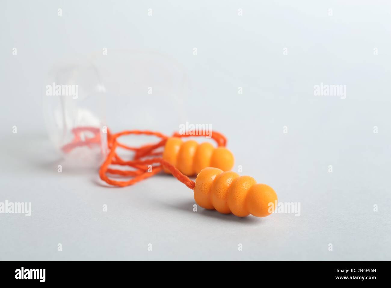 Orange earplugs hi-res stock photography and images - Alamy