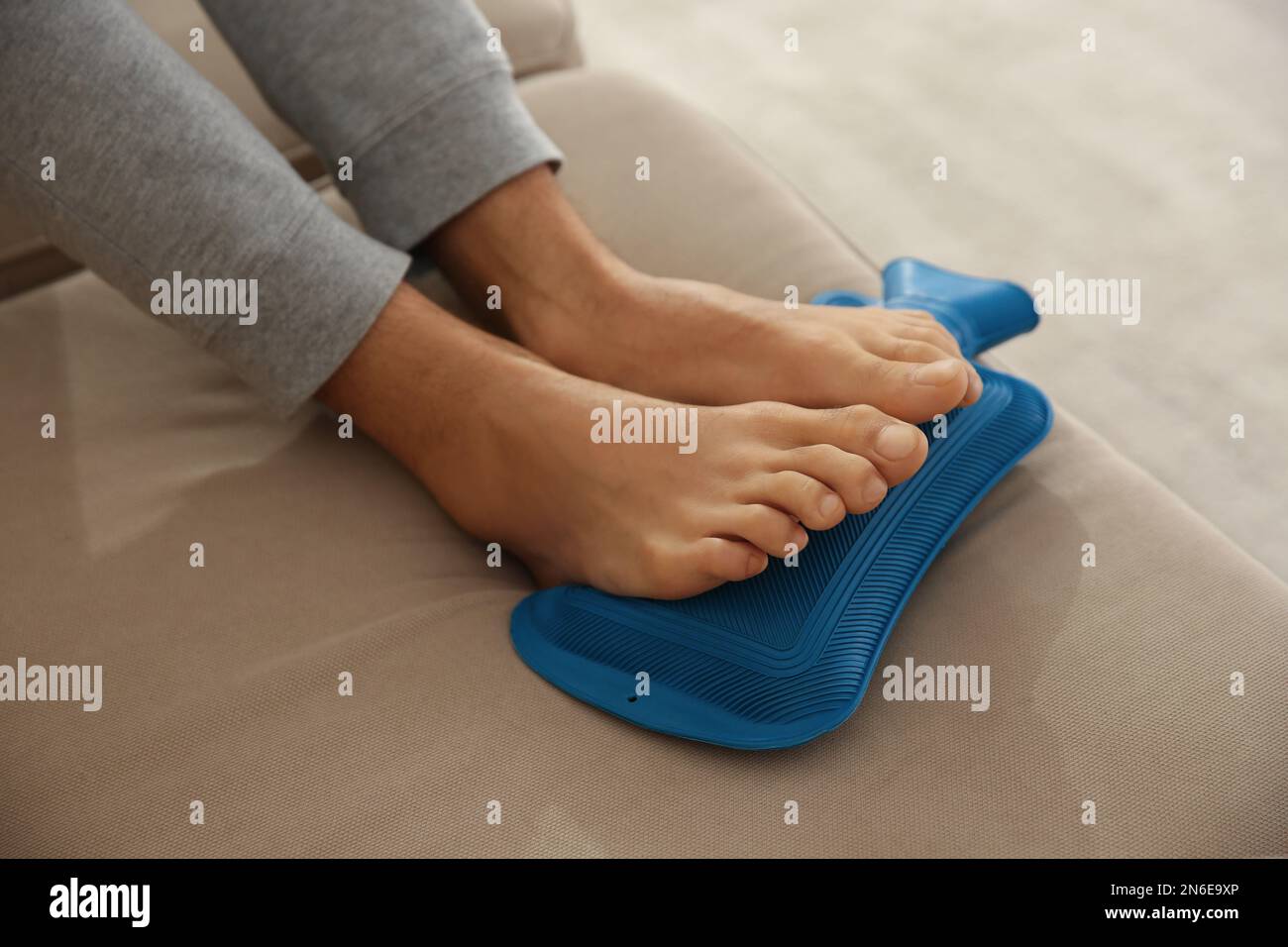 Man warming feet hot hi-res stock photography and images - Alamy