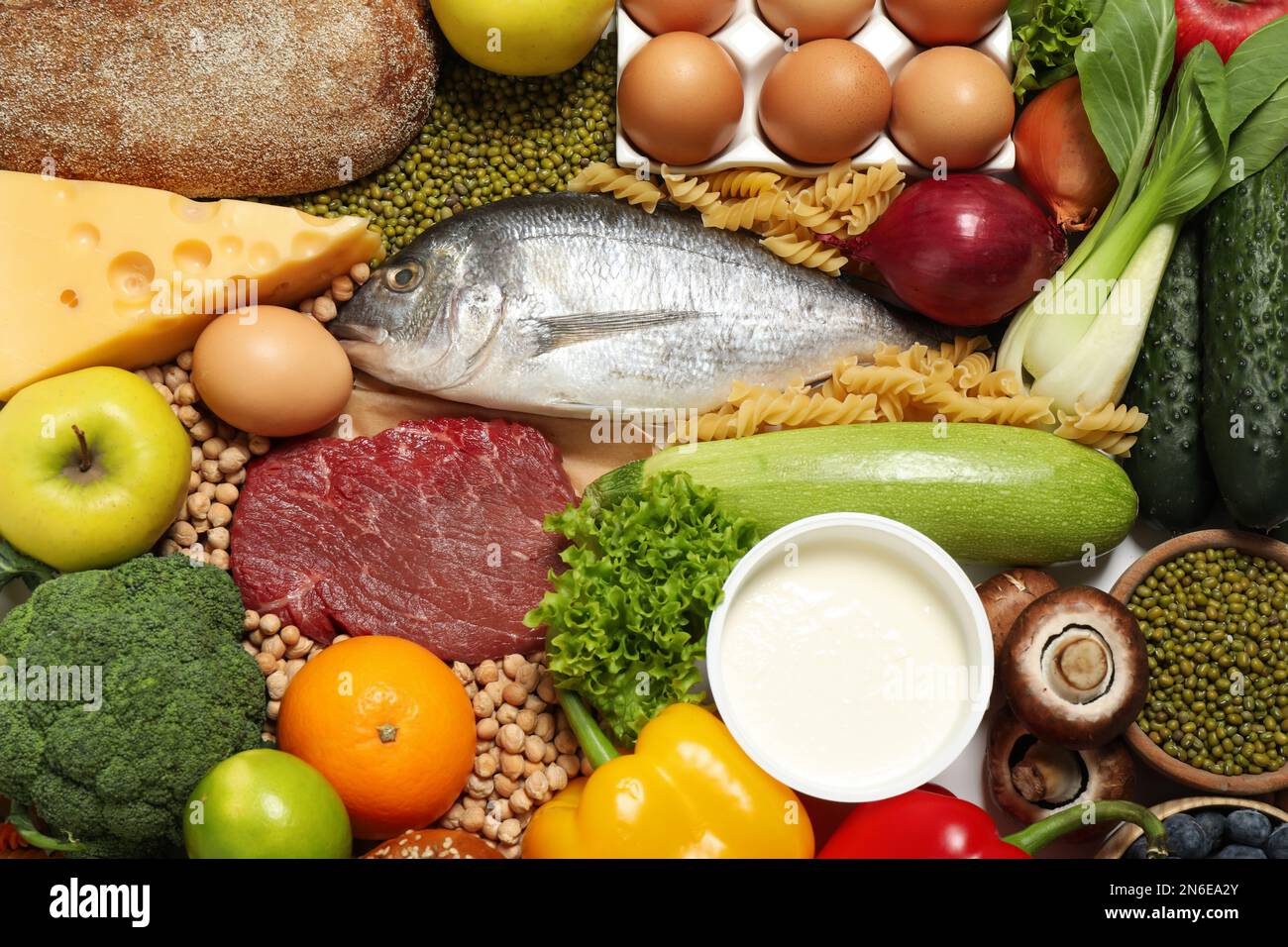 Different products as background, top view. Healthy food and balanced ...
