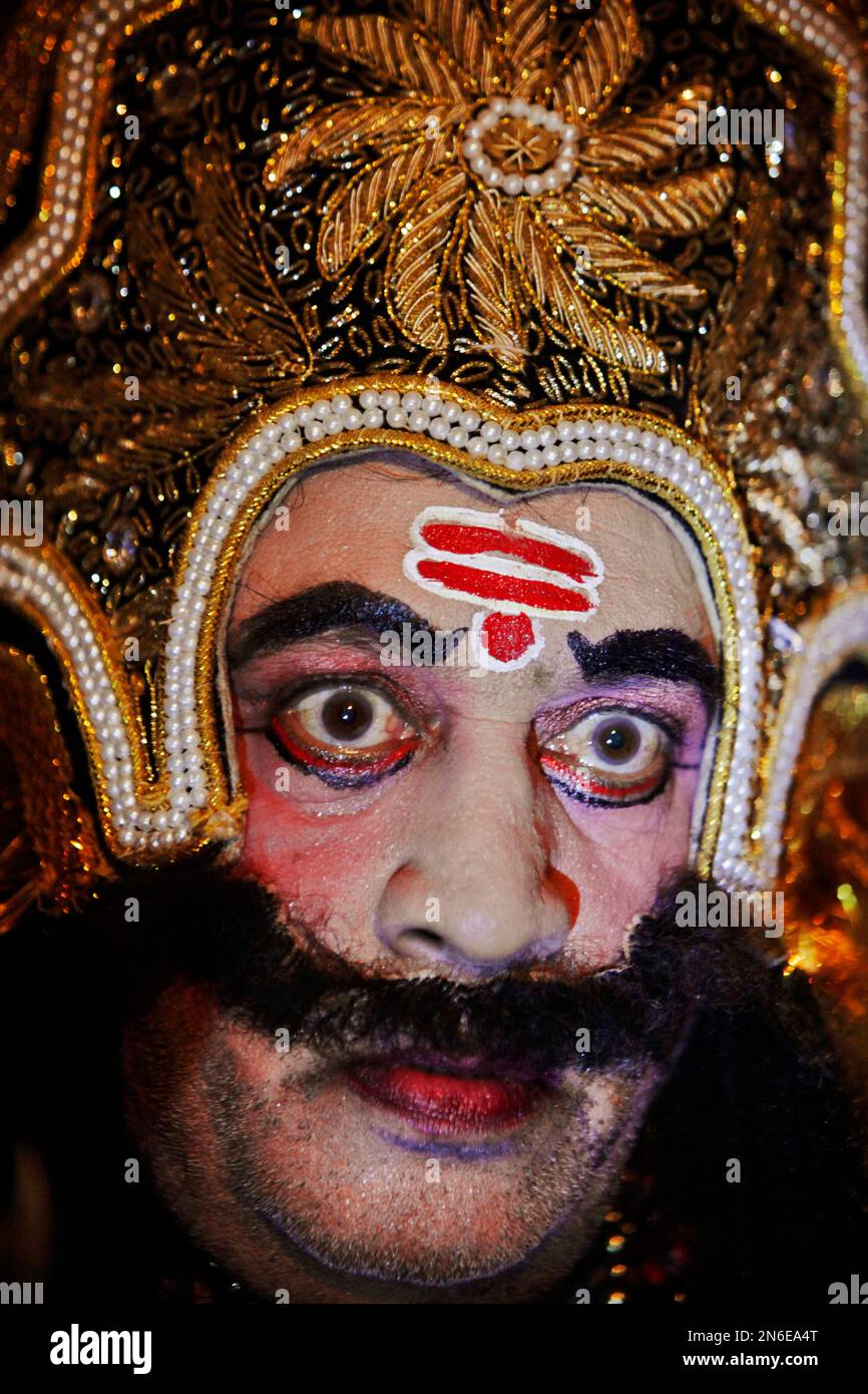 In this Tuesday, Oct. 8, 2013 photo, an Indian artist in the role of ...