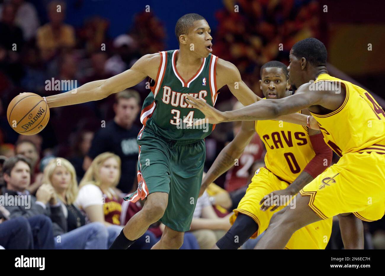 Milwaukee Bucks' Giannis Antetokounmpo (34) tries to get past Cleveland ...
