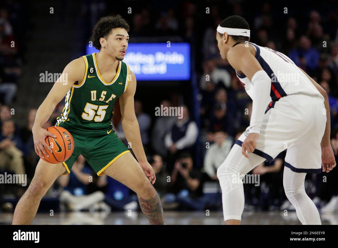 San Francisco guard Marcus Williams, left, controls the ball while ...