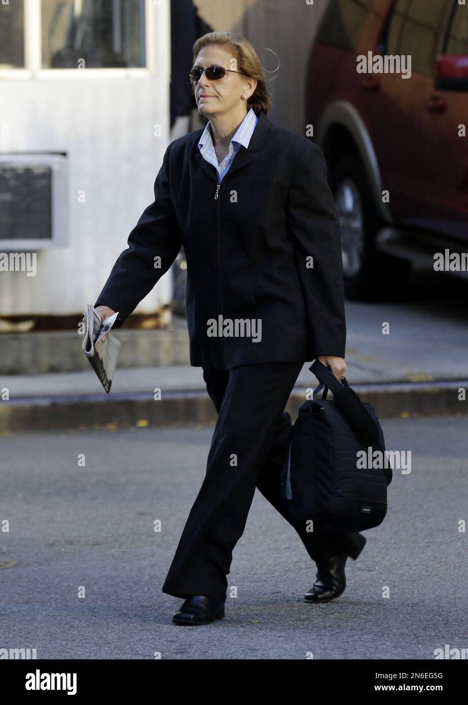 JoAnn Crupi arrives to federal court in New York, Tuesday, Oct. 8, 2013 ...