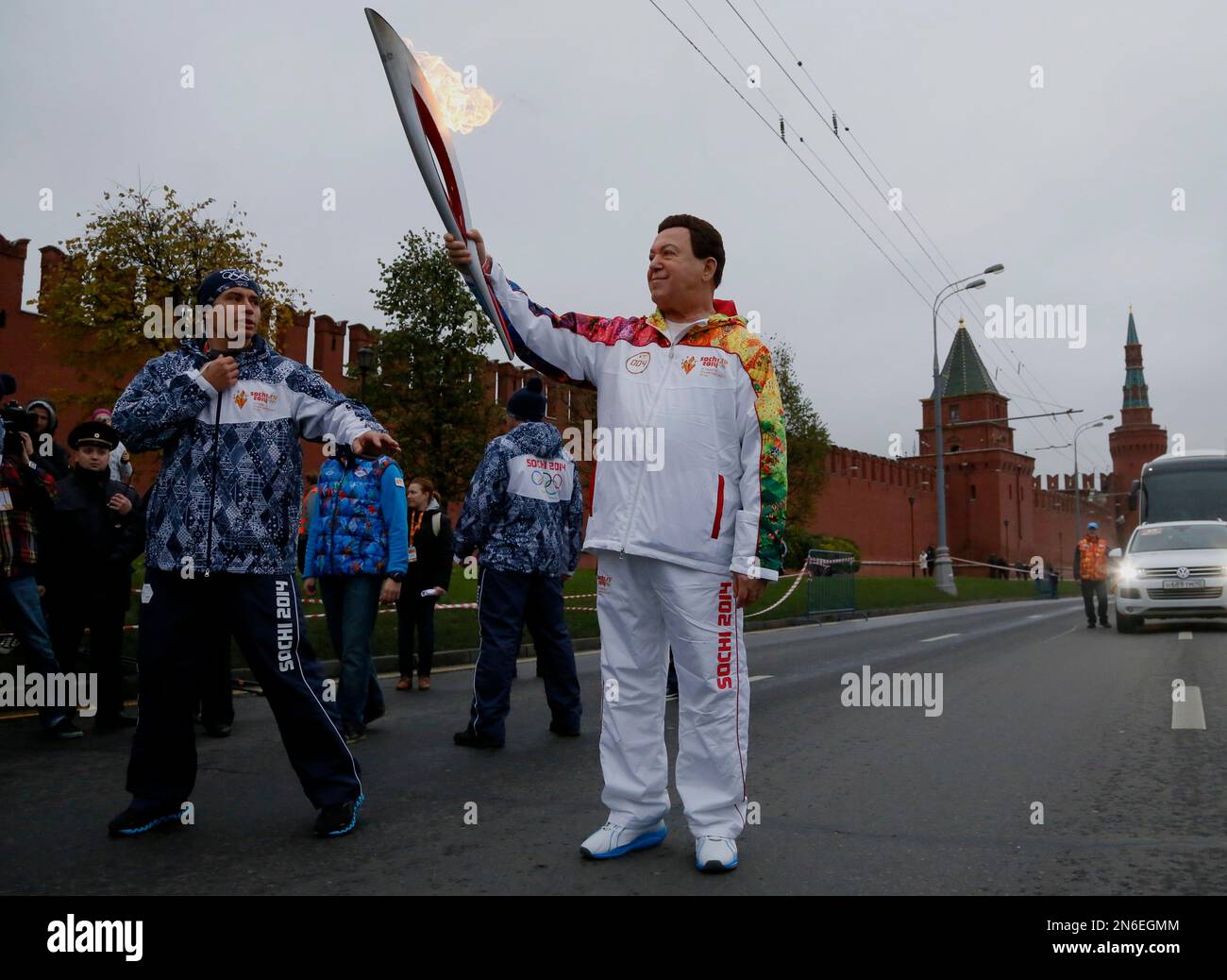 Russian popular singer Iosif Kobzon holds his torch during a relay in ...
