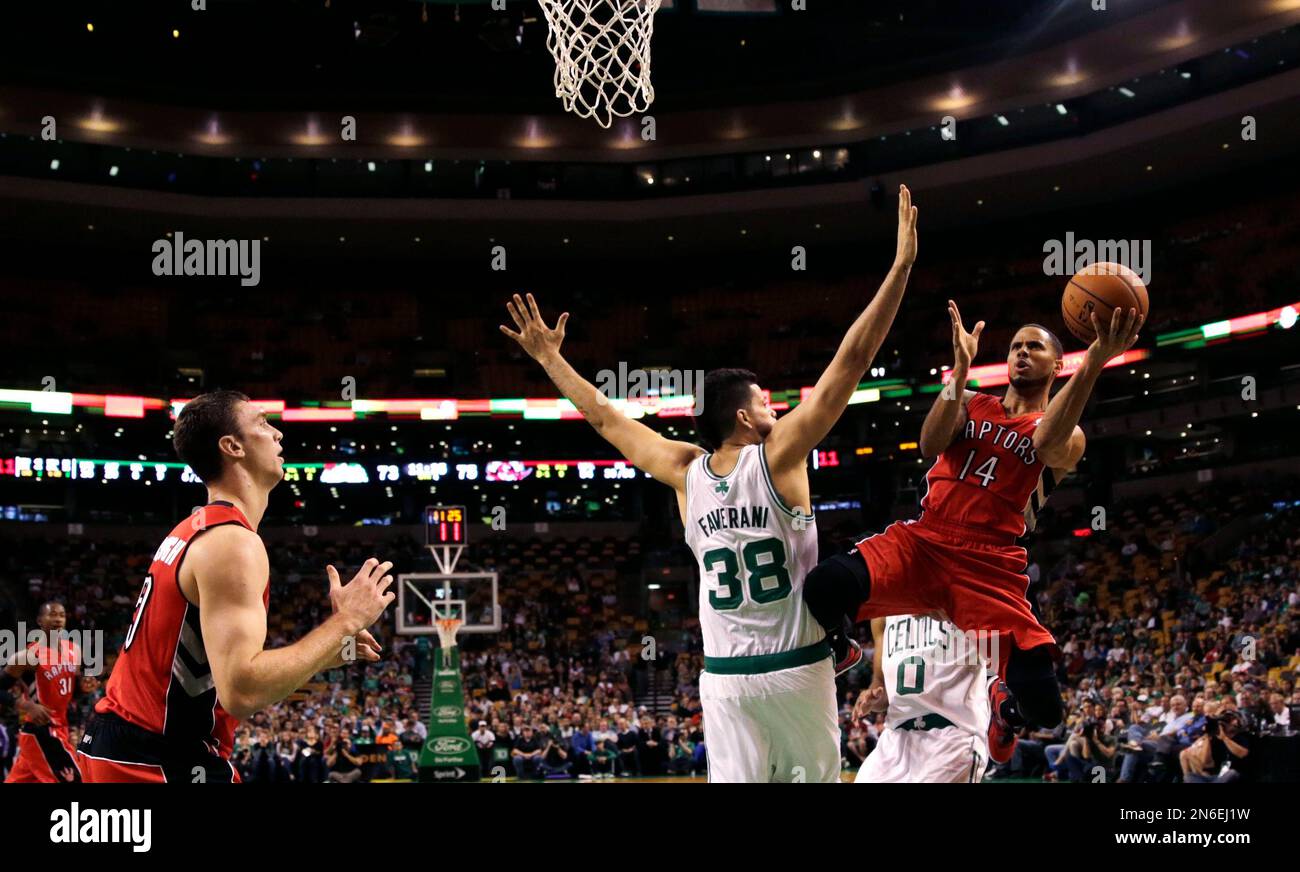Toronto Raptors point guard D.J. Augustin (14) shoots as he gets past ...