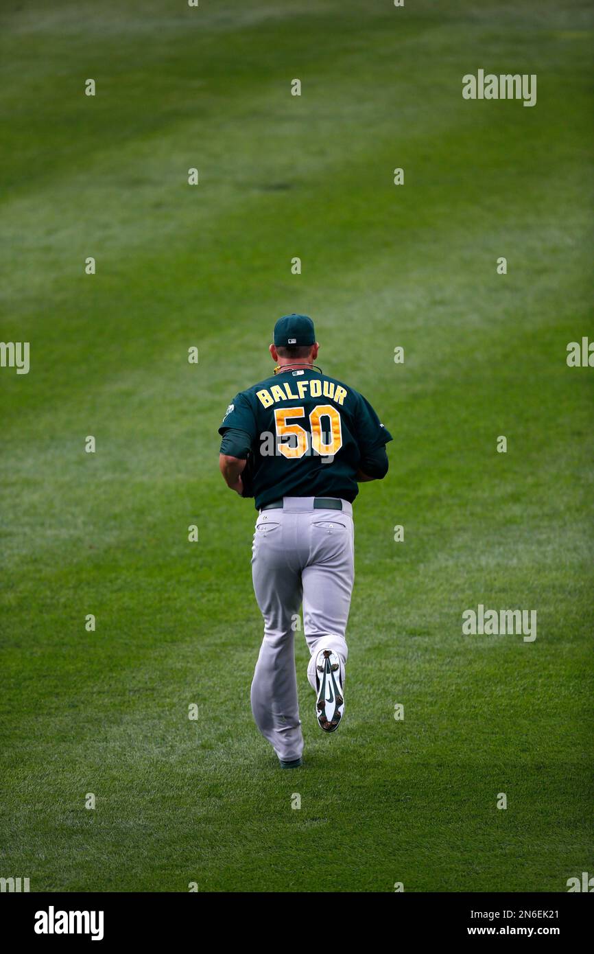 Oakland Athletics relief pitcher Grant Balfour (50) runs to the mound ...