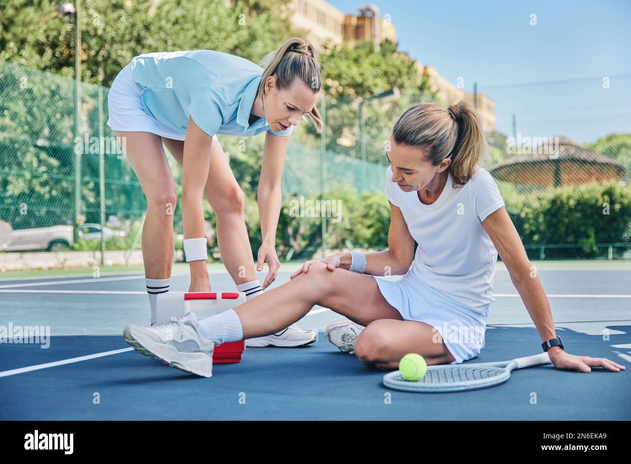 Tennis, medic with first aid and woman with knee pain, torn muscle or ...