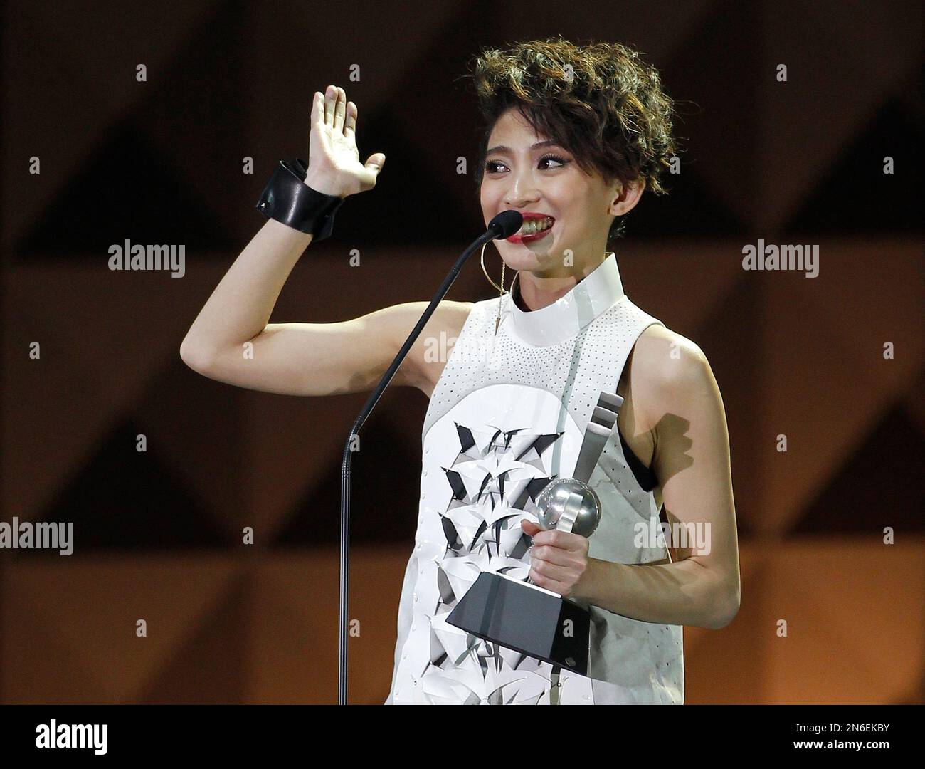 Malaysian singer Penny Tai speaks after receiving the Best Female ...