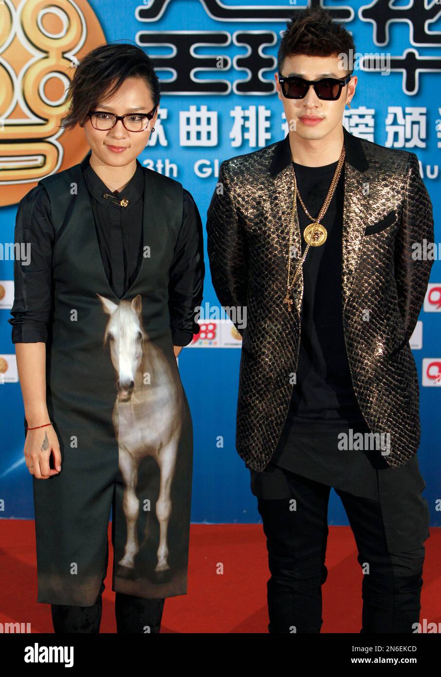 Chinese singer Zhou Bichang, left, and Taiwanese singer Wilber Pan pose ...