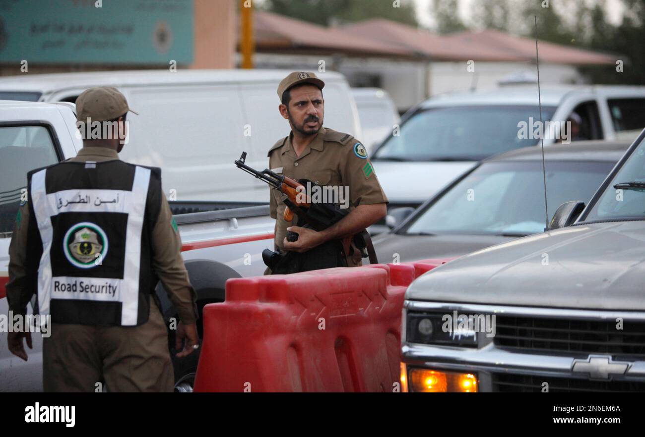 A Saudi policeman carrying an automatic weapon mans the Al-Shimaisi ...