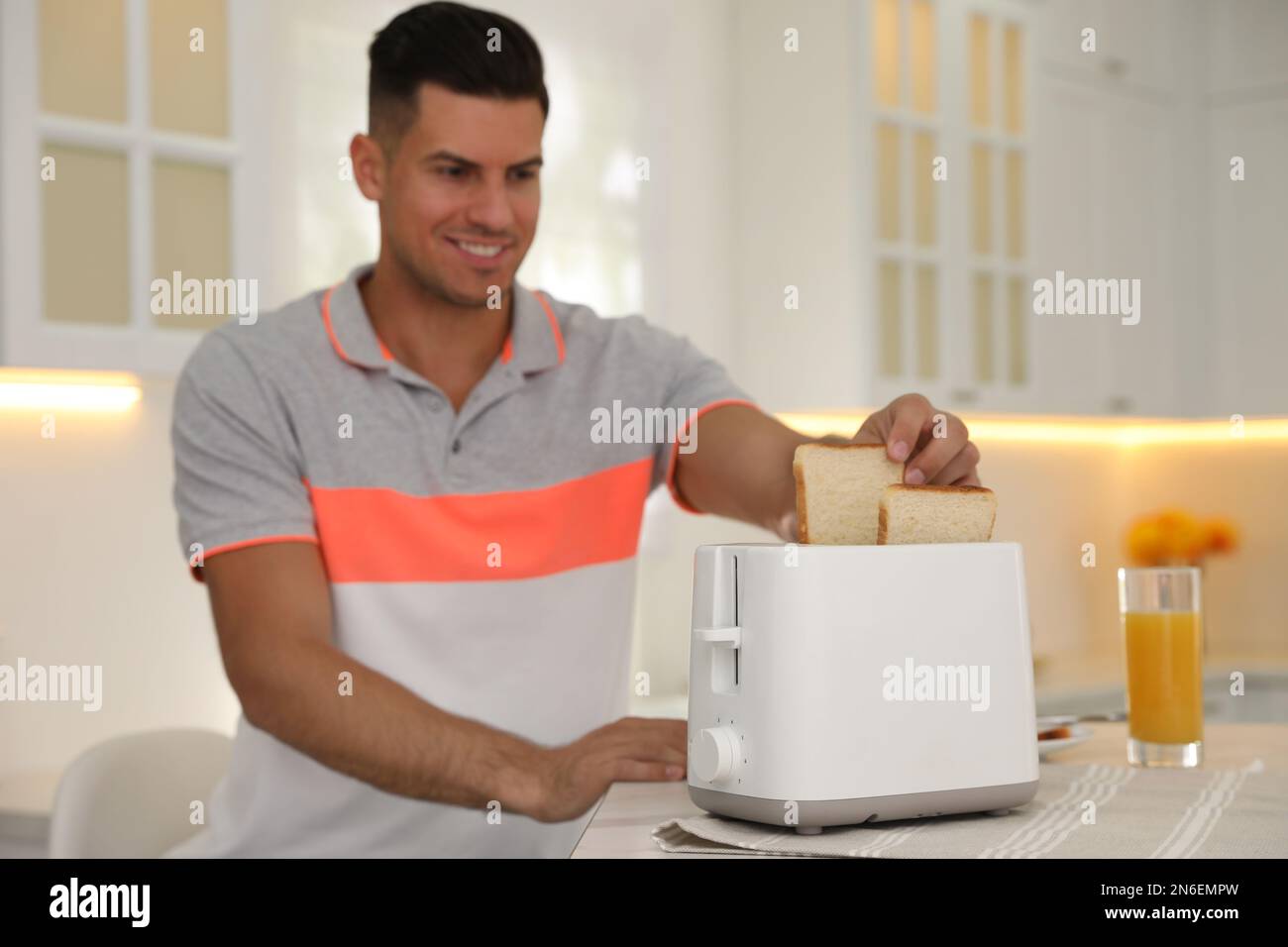 Man toaster hi-res stock photography and images - Alamy