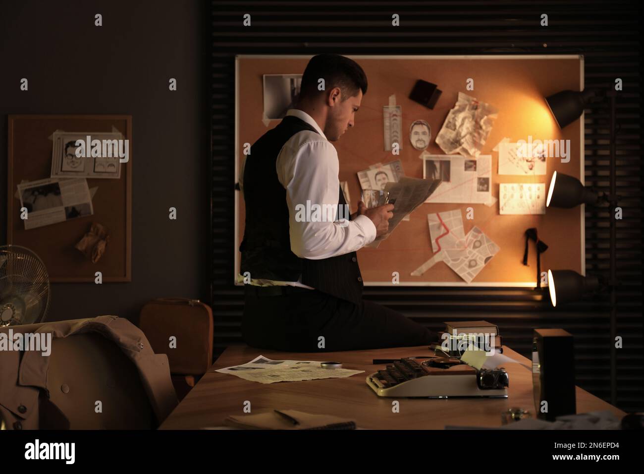 Old fashioned detective with documents near investigation board in ...