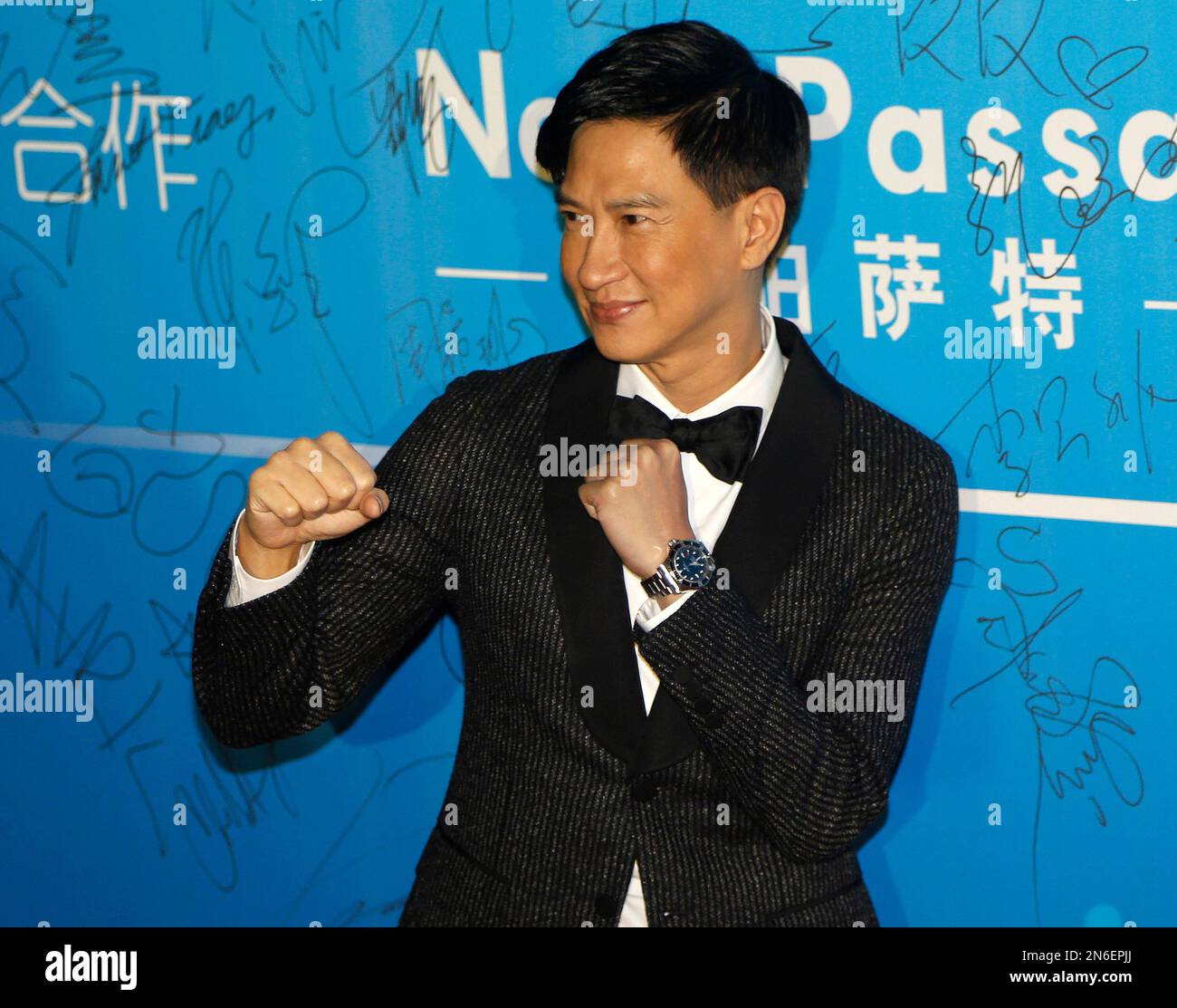 Hong Kong actor Nick Cheung poses on the arrival at the 10th Huading ...