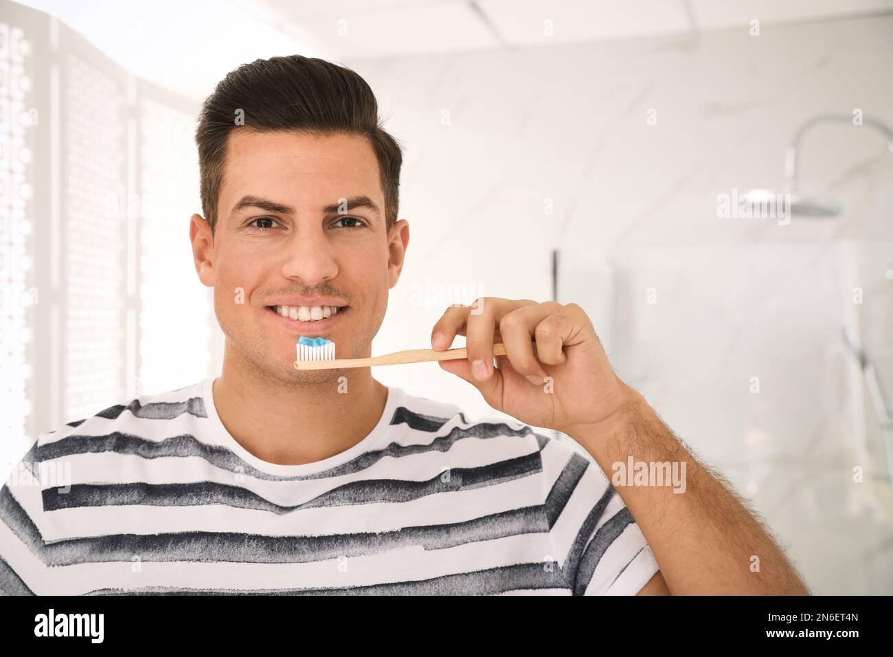 Male toothbrush in hand hi-res stock photography and images - Alamy