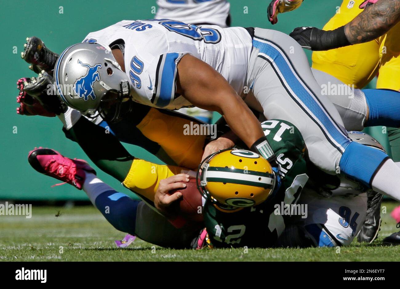 Green Bay Packers quarterback Aaron Rodgers is sacked by Detroit Lions ...