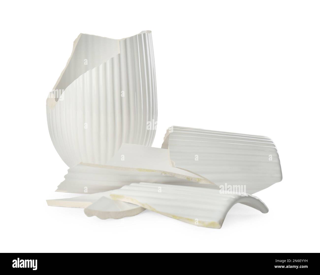 Broken bright ceramic vase isolated on white Stock Photo - Alamy