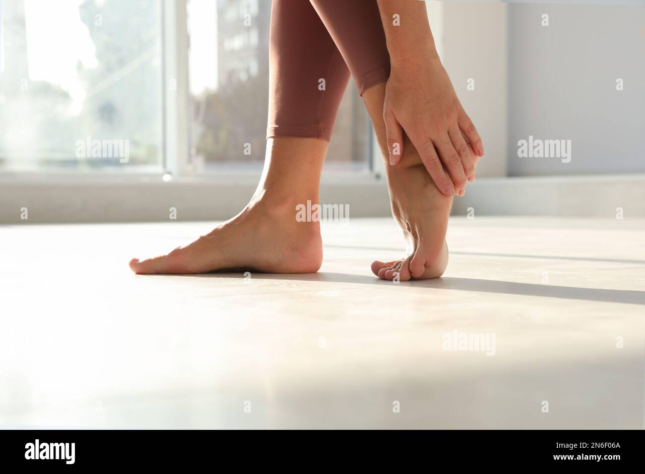 Woman aching feet hi-res stock photography and images - Alamy