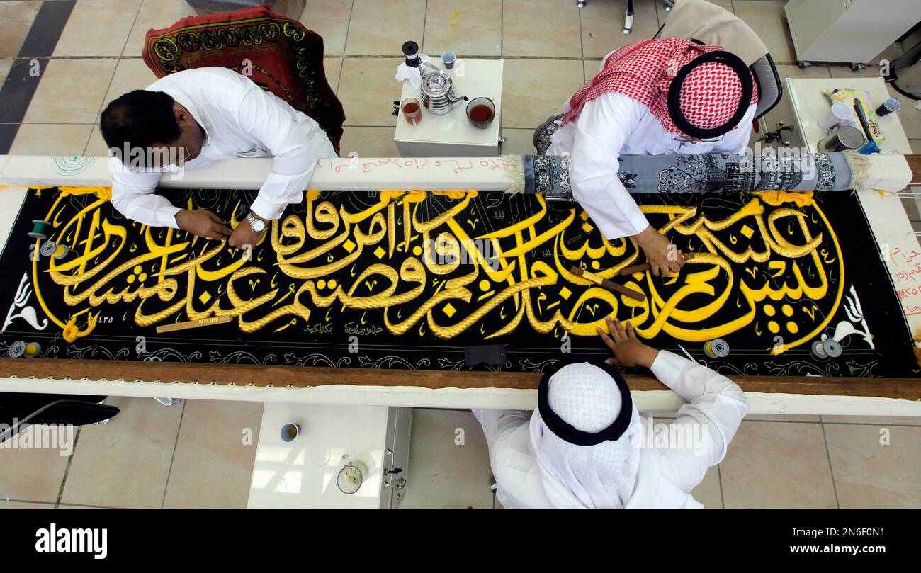 Saudi workers embroider Islamic calligraphy, using either pure silver ...