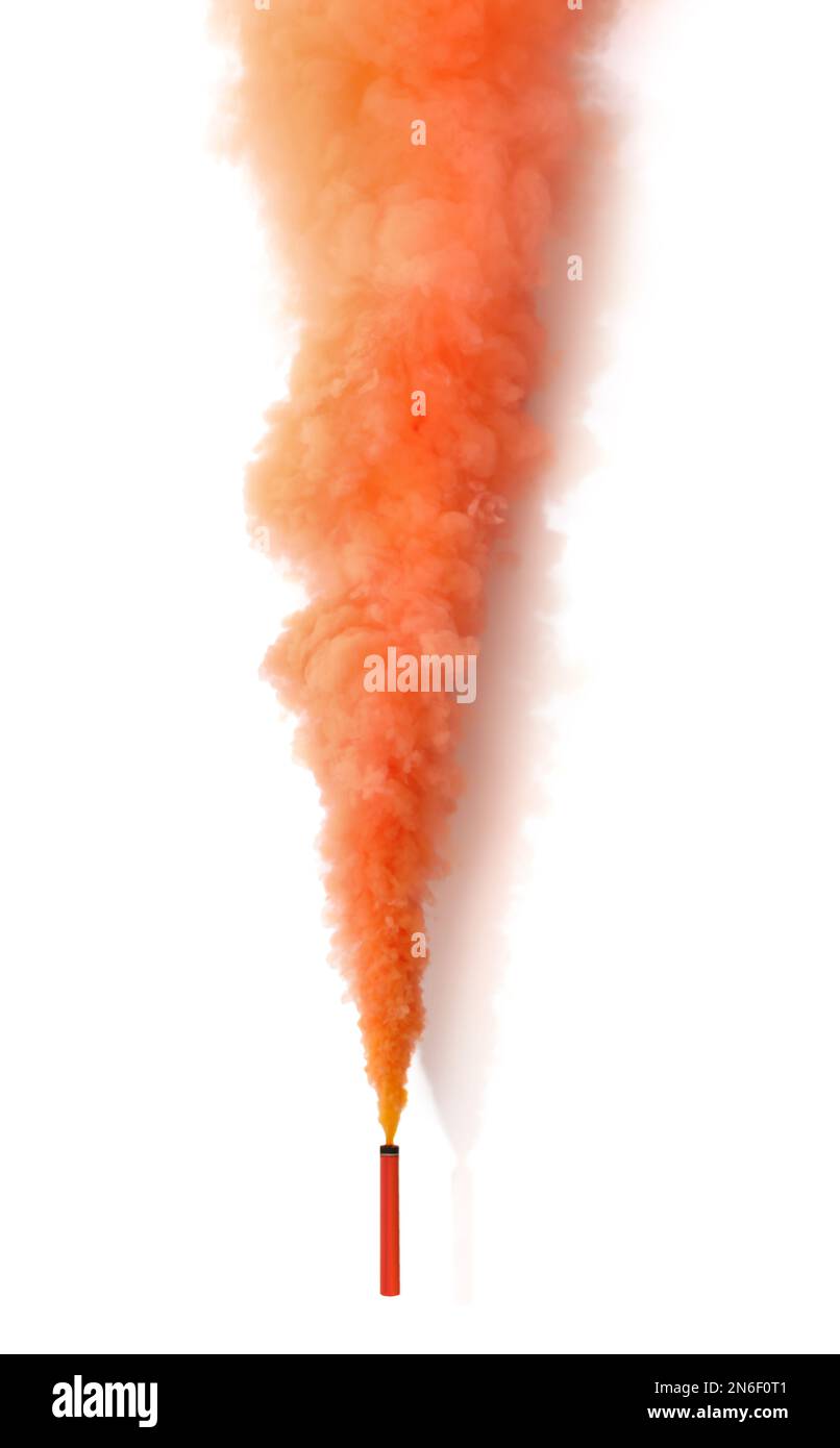 Bright orange smoke bomb on white background Stock Photo - Alamy