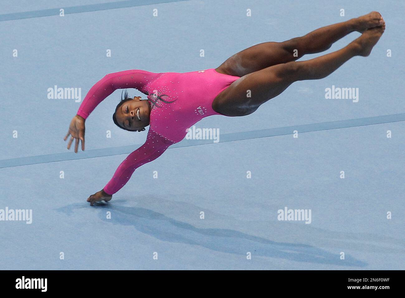 Gold medallist Simone Biles of the U.S. competes to win the floor ...