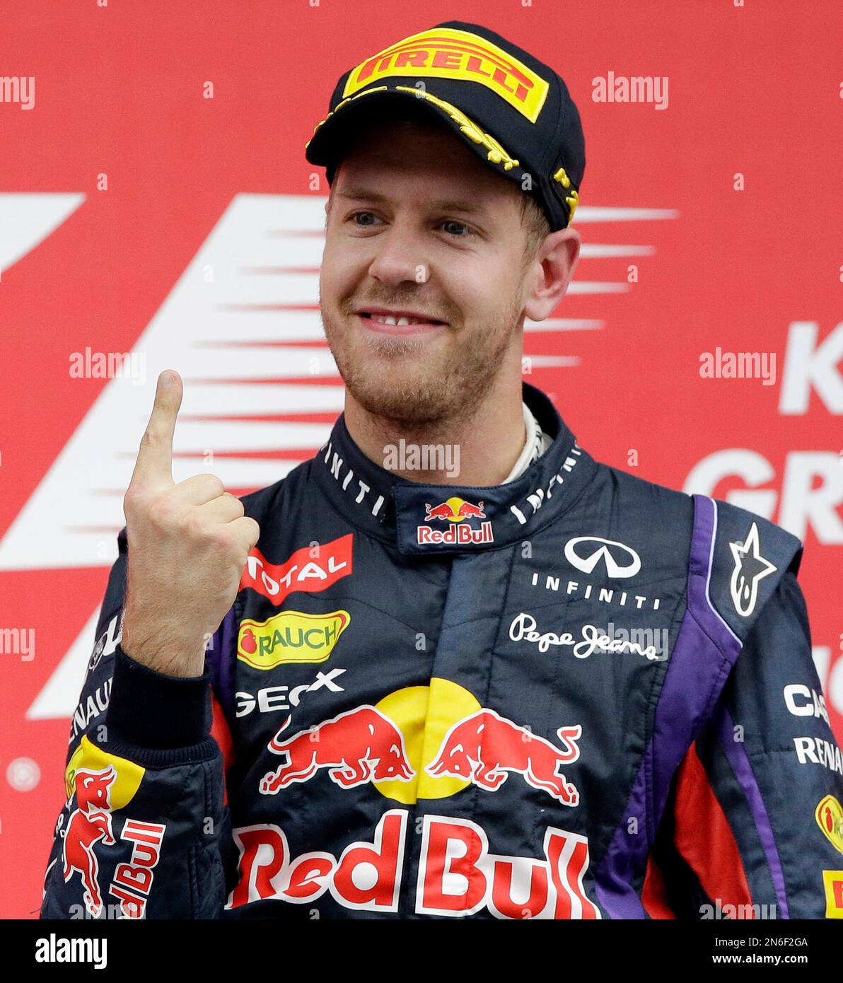 Red Bull driver Sebastian Vettel of Germany gestures as he celebrates ...
