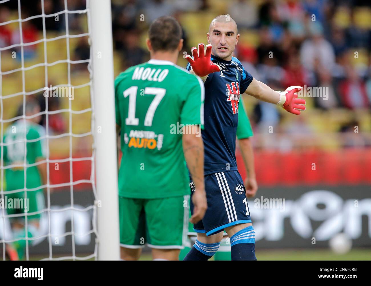 Saint Etienne goalkeeper Stephane Ruffier of France, gestures to his ...