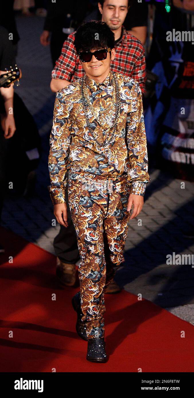 Malaysian singer Gary Chaw arrives on the red carpet at the 13th Global ...