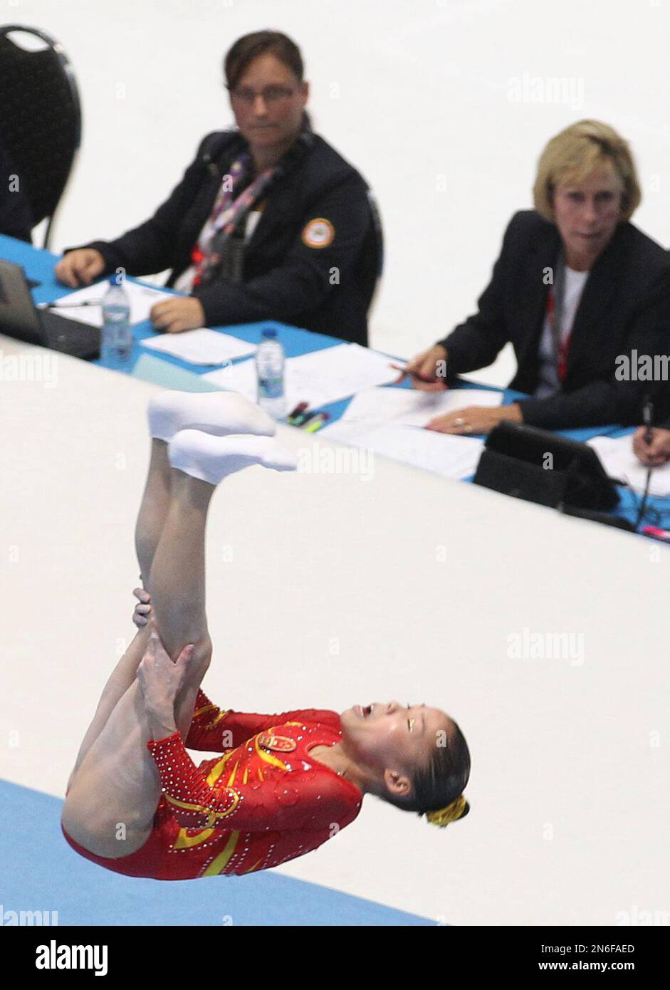 Shang Chunsong from China performs on the floor, during the all-around ...