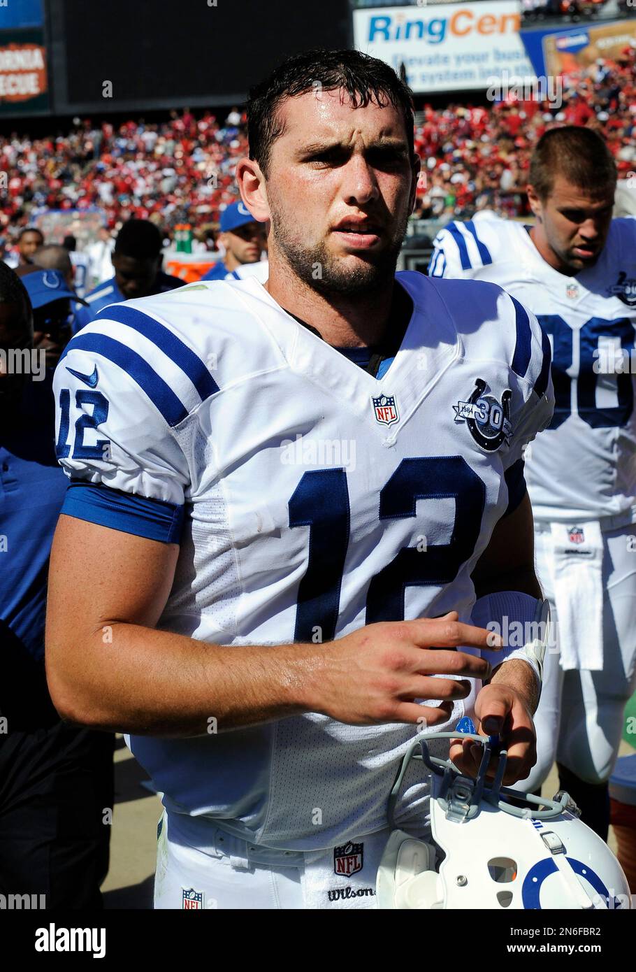 Indianapolis Colts quarterback Andrew Luck (12) heads off the field at ...