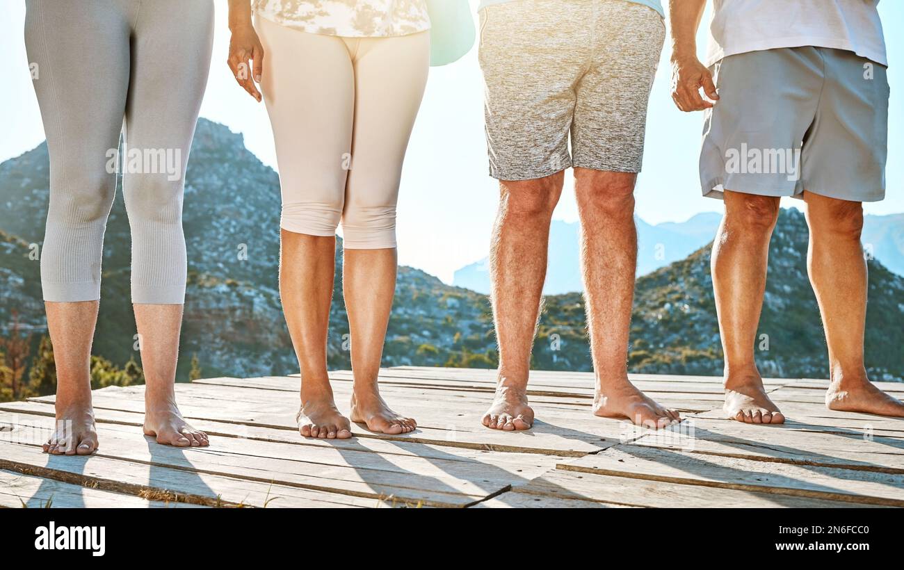 Close up of a group of seniors feet. Midsection of mature people ...