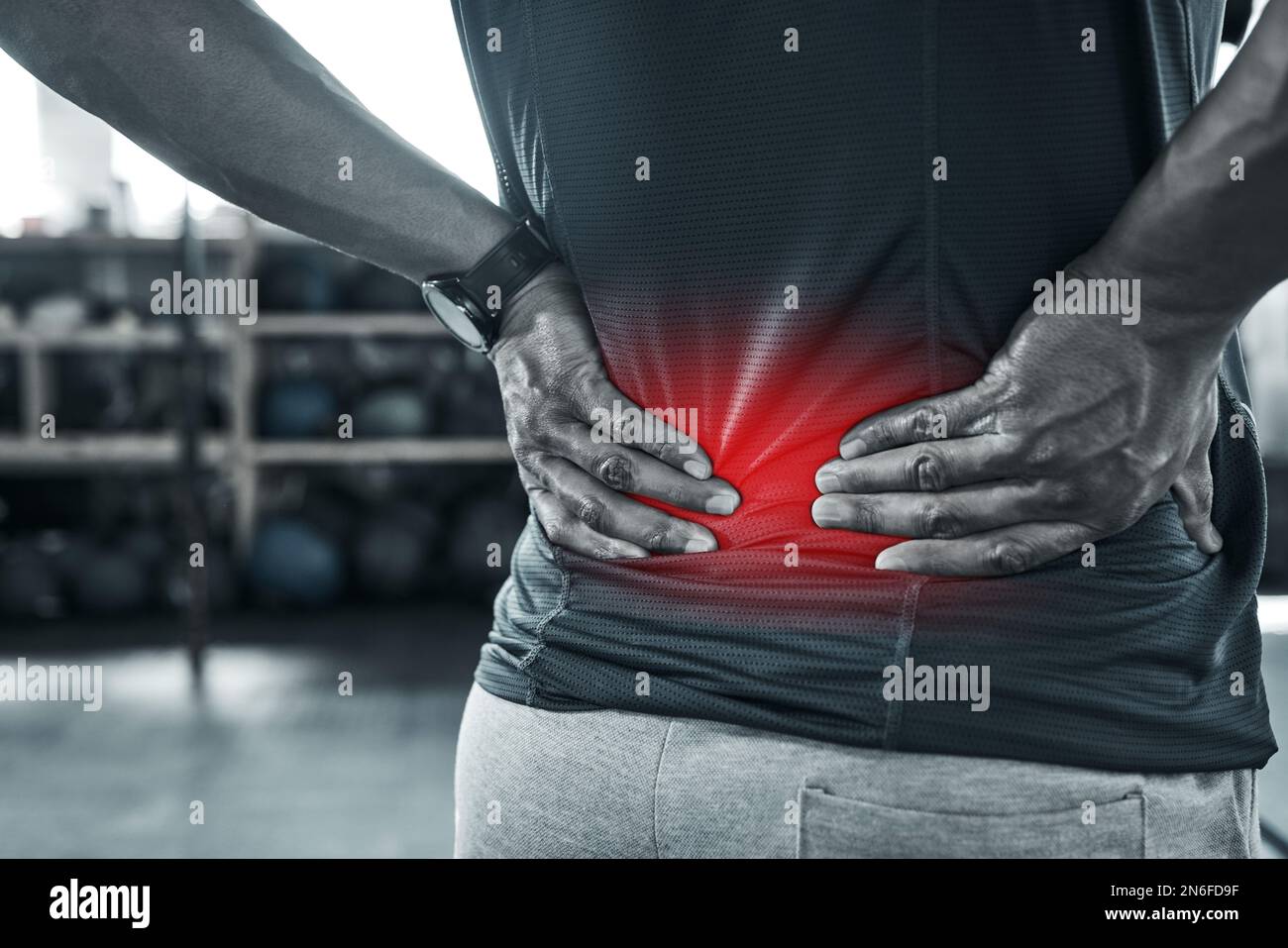 His back is aching. Back of an athlete in pain. All bodybuilders ...