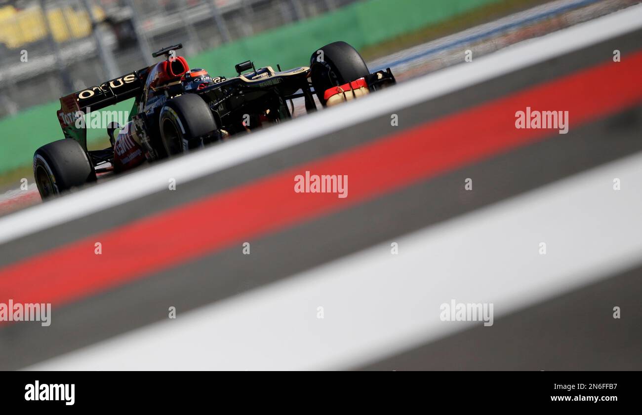 Lotus driver Kimi Raikkonen of Finland steers his car during the first ...