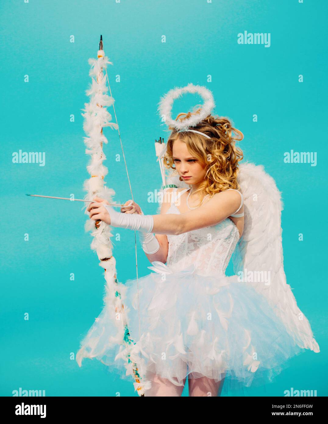 Cupid girl aiming at someone with an arrow of love. Arrow of love ...