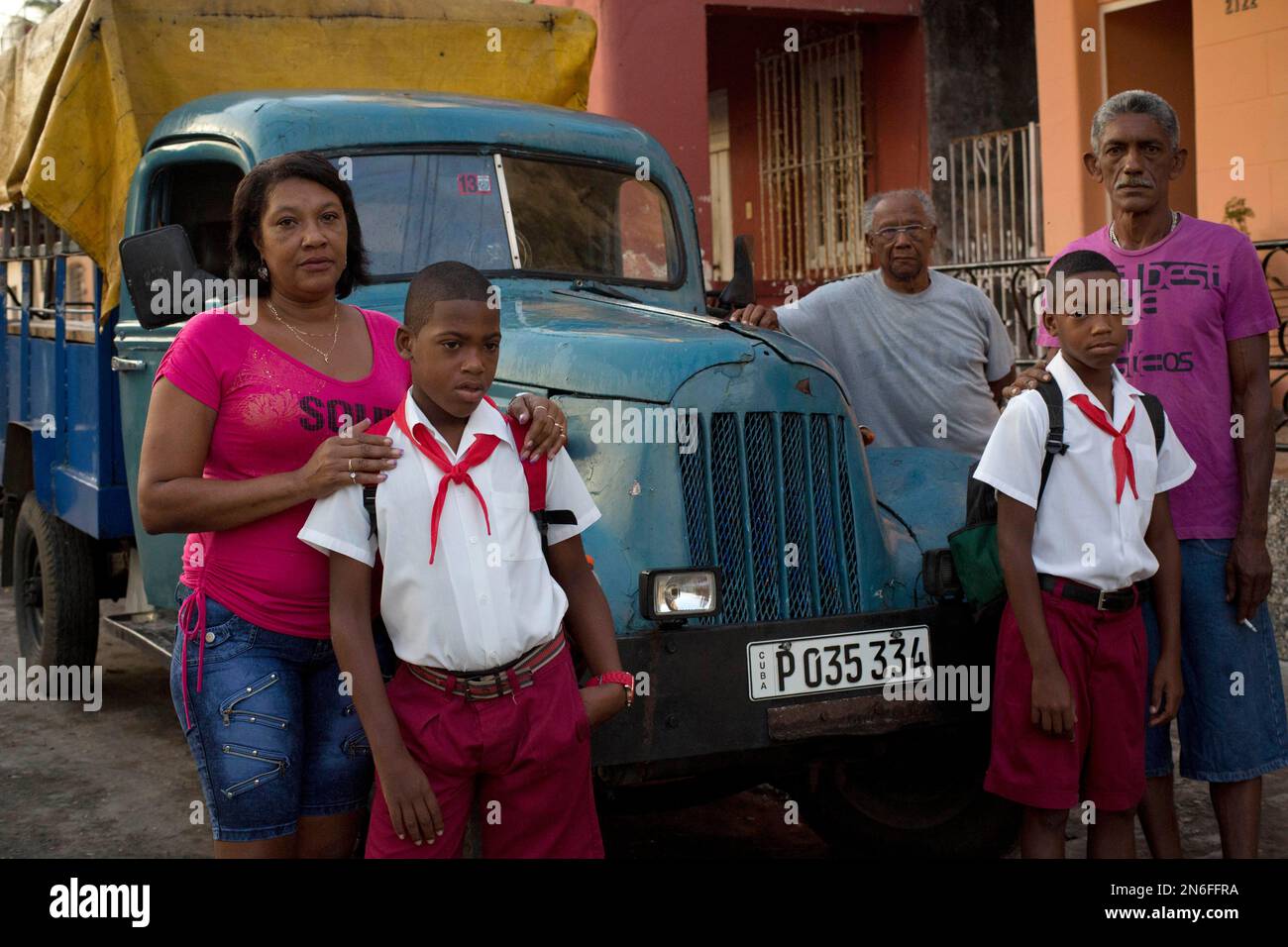 In this Sept. 23, 2013 photo, 11-year-old twin brothers Arian and ...