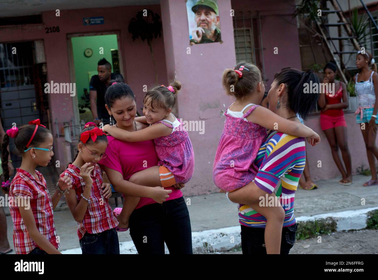 In this Sept. 23, 2013 photo, from left to right, nine-year-old twins ...