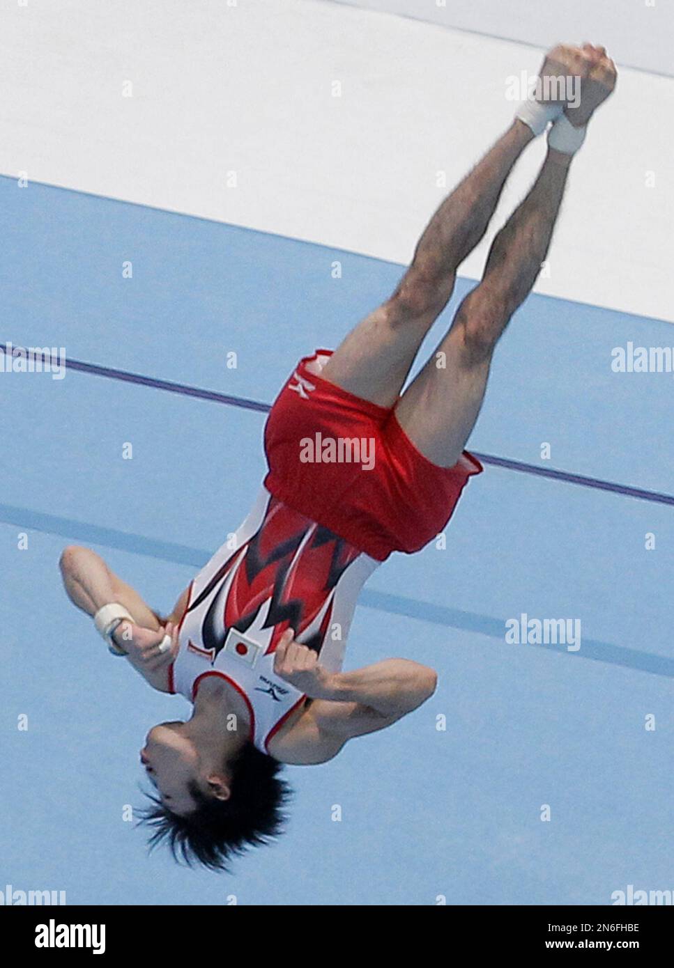 Japan's Kohei Uchimura competes in the floor exercise during the all ...