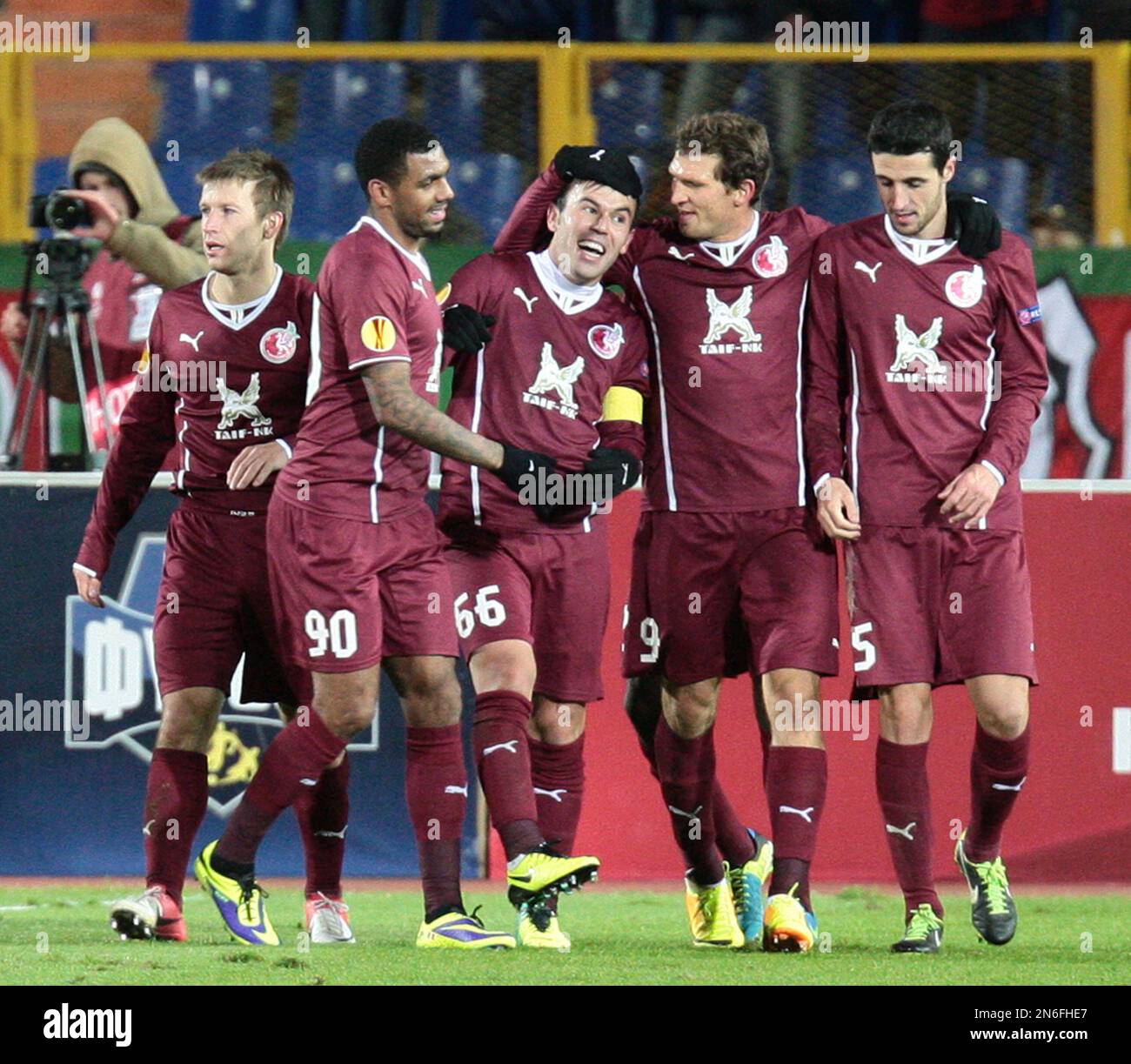 Rubin Kazan's Bebras Natcho, centre, with his team members celebrate ...