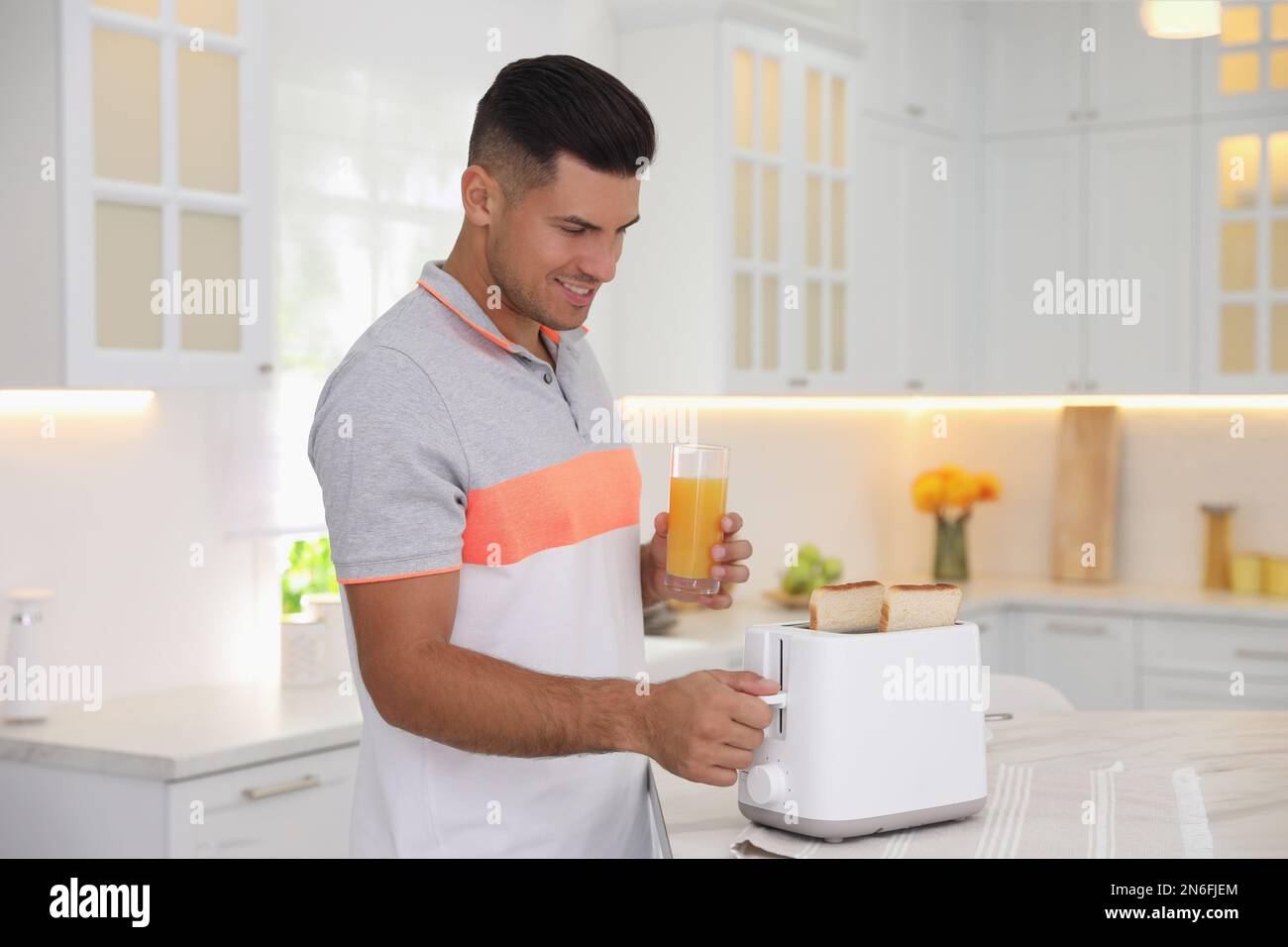Man toaster hi-res stock photography and images - Alamy