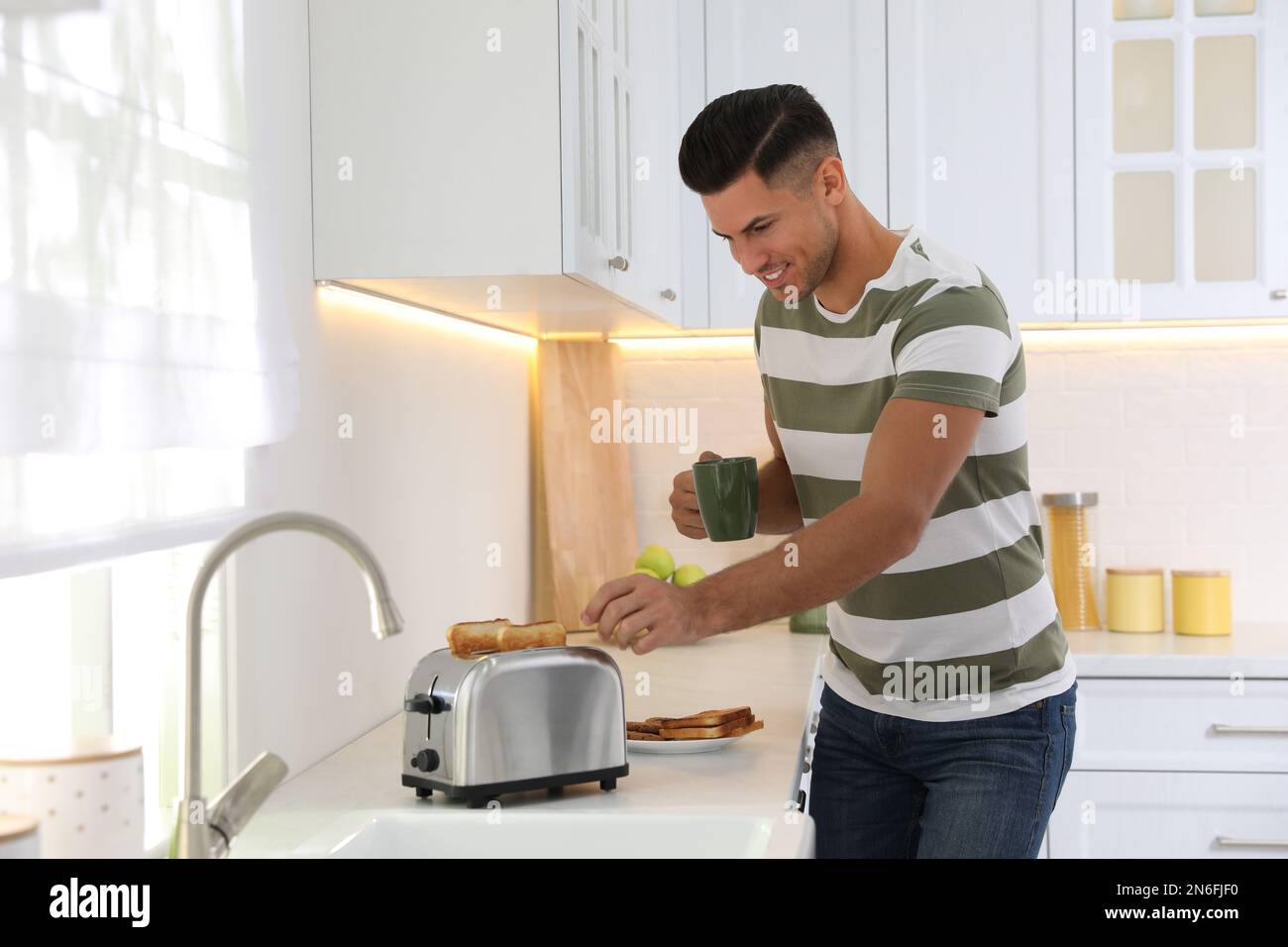 Man toaster hi-res stock photography and images - Alamy