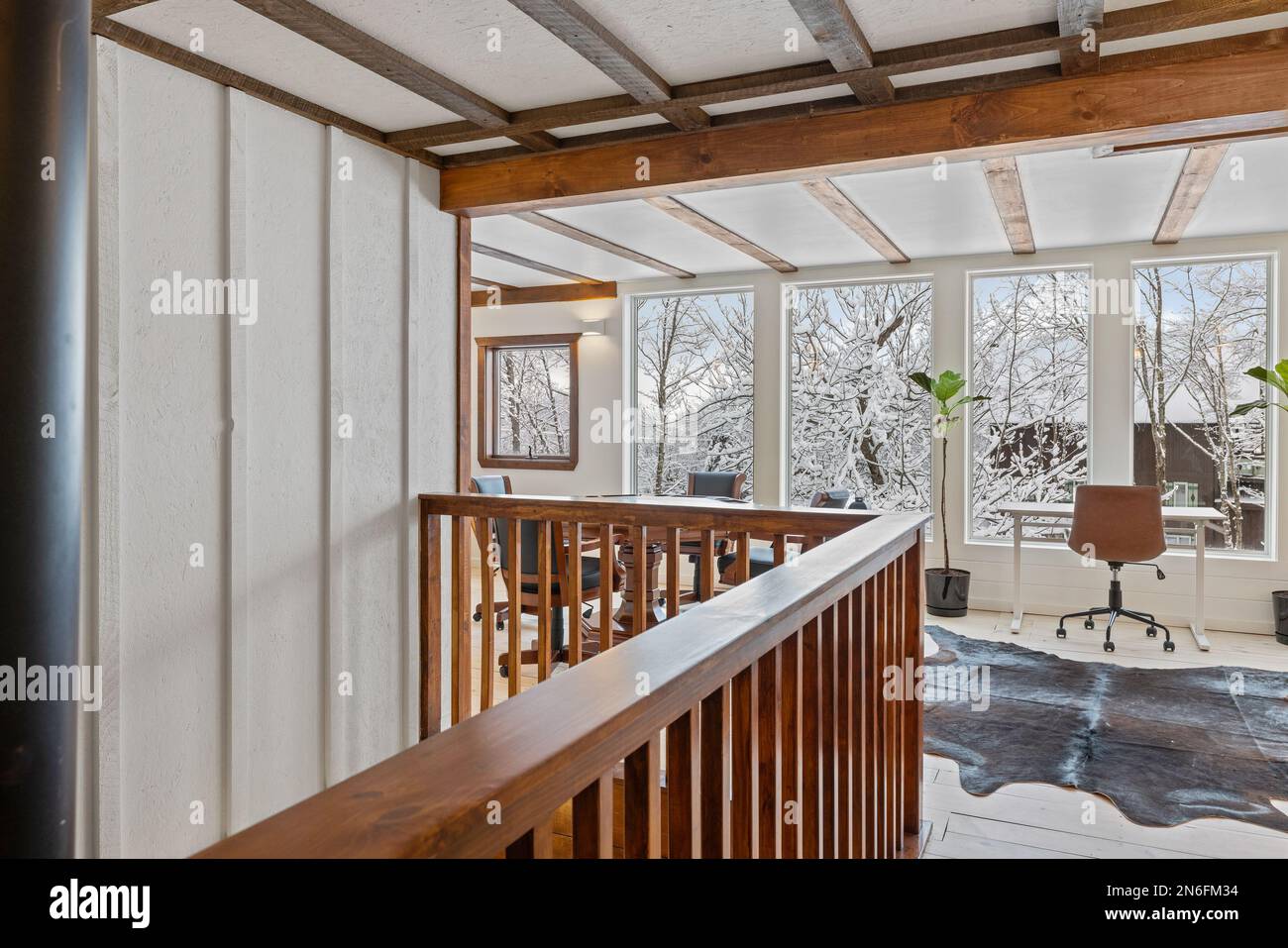 A modern extensive office with wide windows and horseshoe bar Stock ...