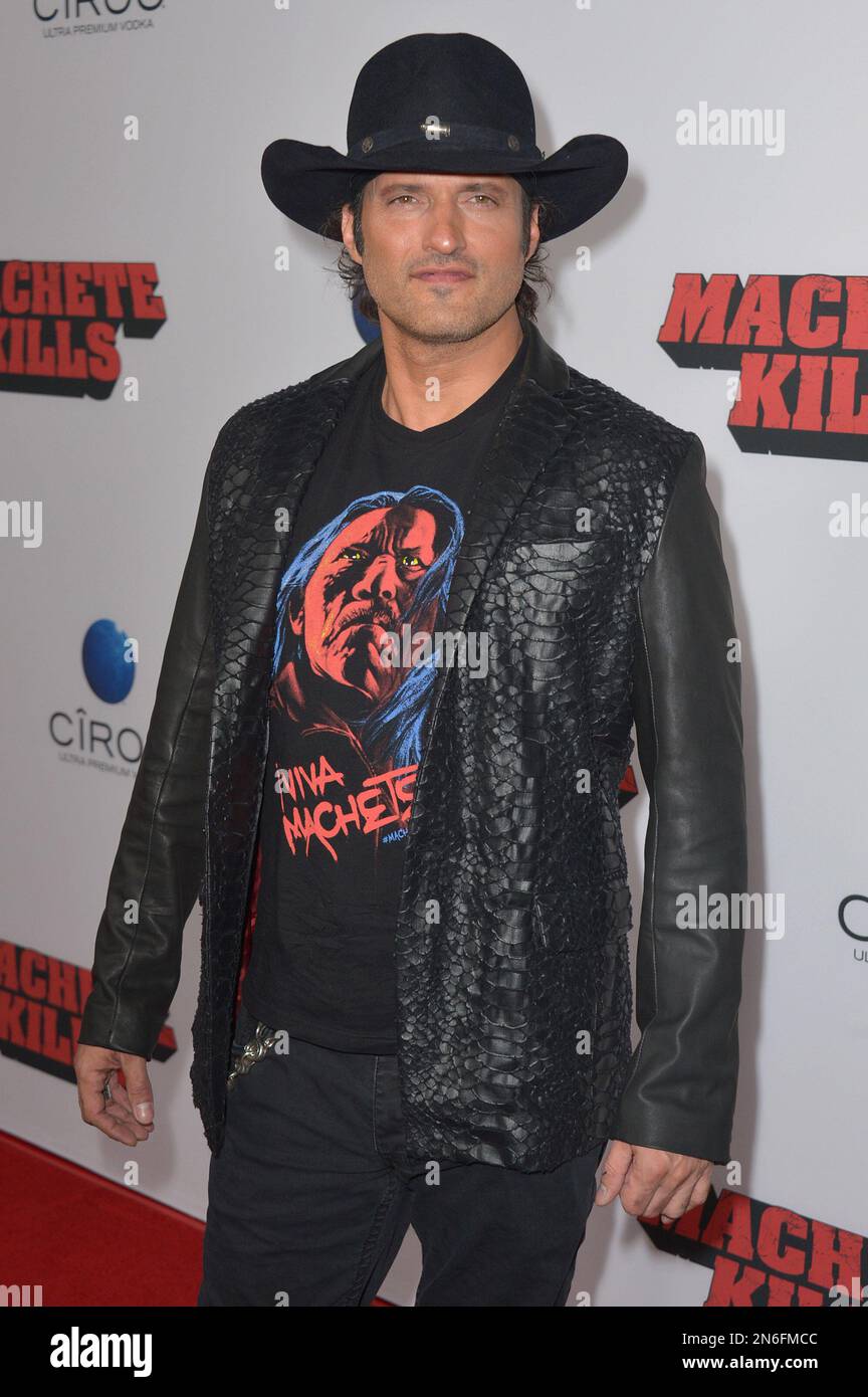 Robert Rodriguez arrives at the premiere of "Machete Kills" at Regal ...