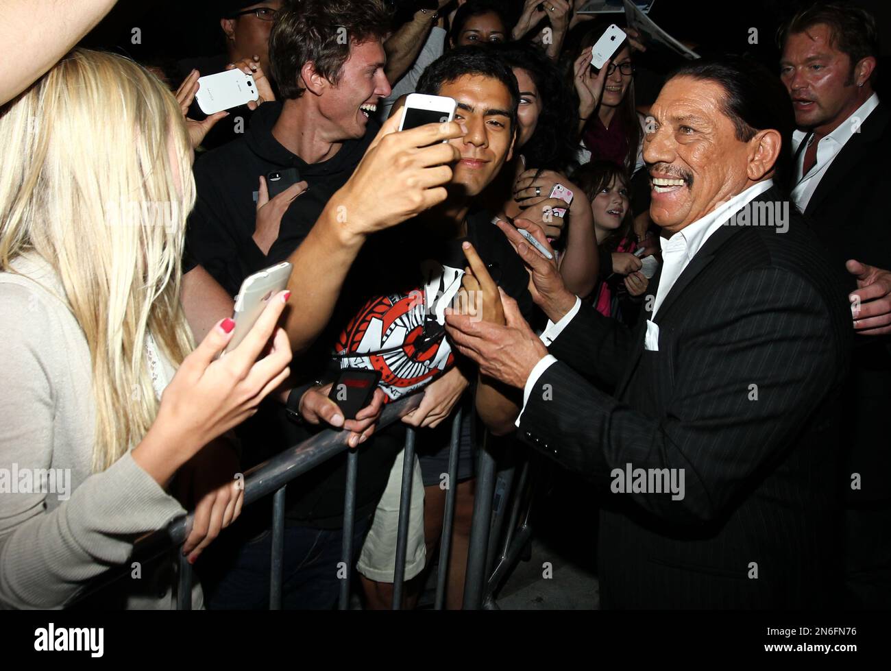 Danny Trejo arrives on the red carpet of the premiere of "Machete Kills ...