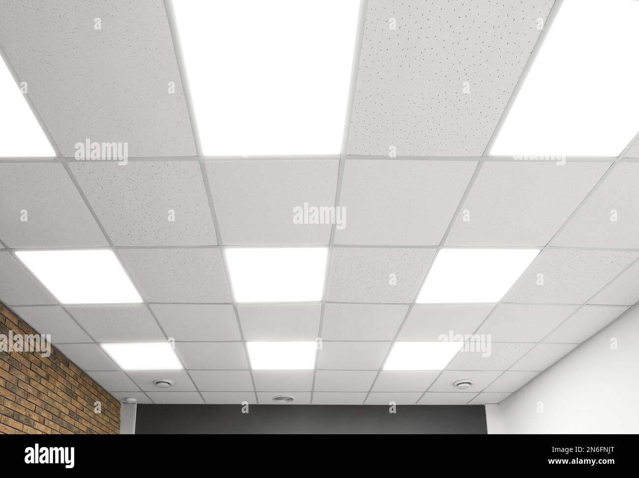White ceiling with lighting in office room Stock Photo - Alamy