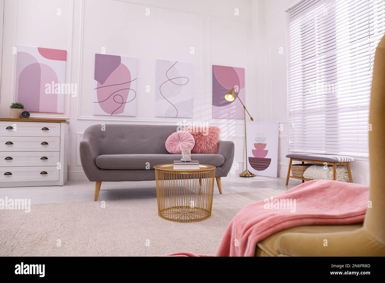 Stylish living room interior with comfortable sofa and beautiful ...