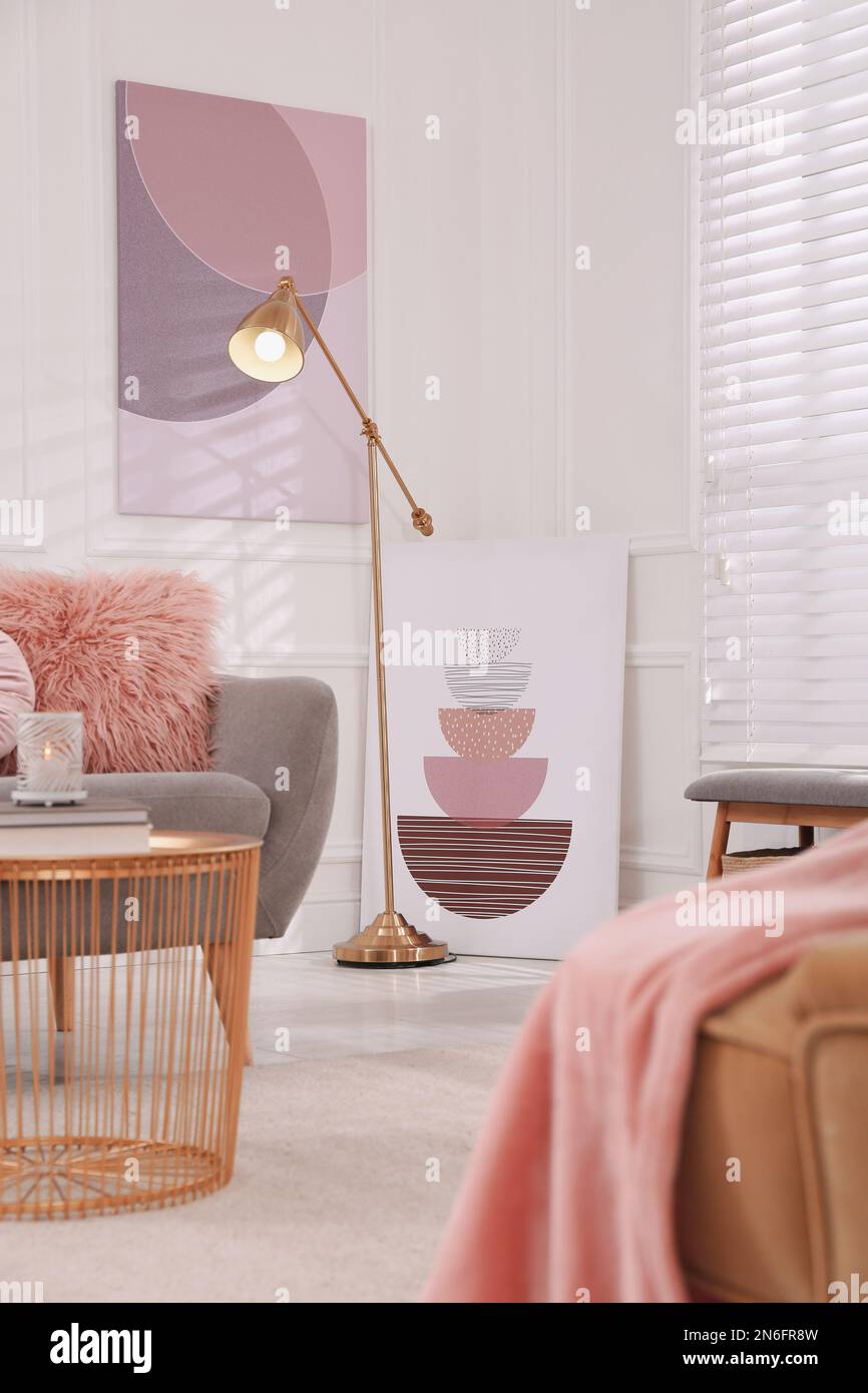 Stylish living room interior with comfortable sofa and beautiful ...