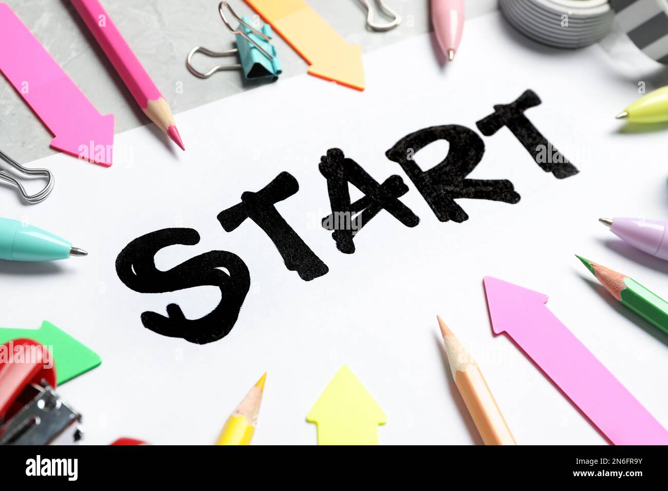 Sheet of paper with word Start and stationery on table, closeup Stock ...