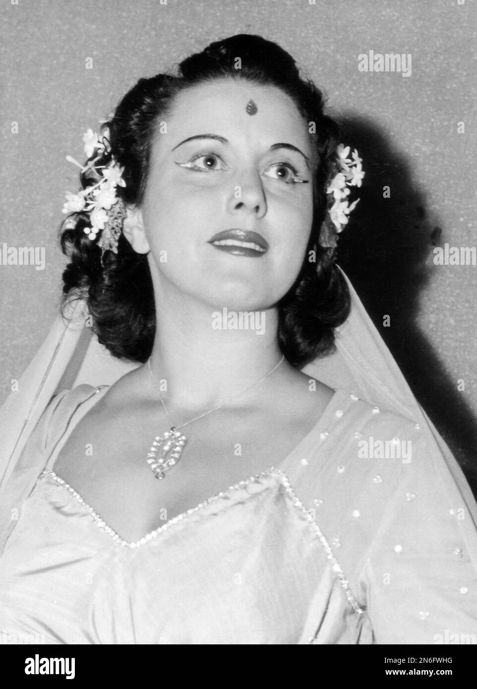 Swiss soprano Lisa Della Casa, in character as "Pamina" is shown before ...