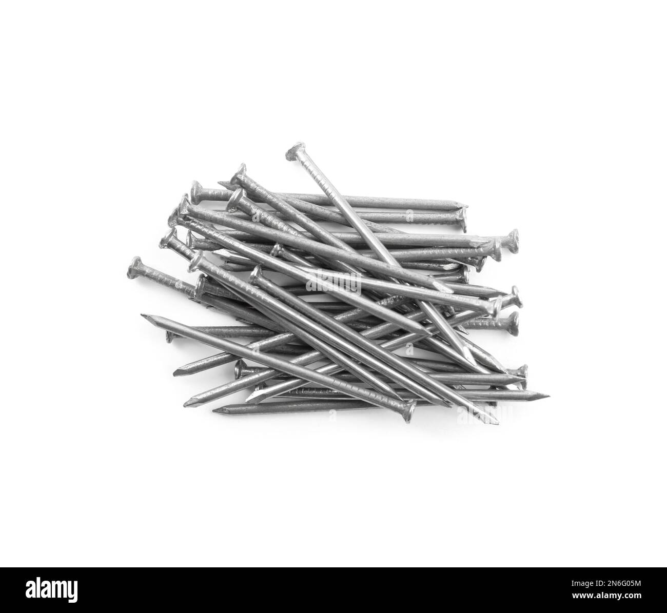 Pile of metal nails on white background Stock Photo - Alamy